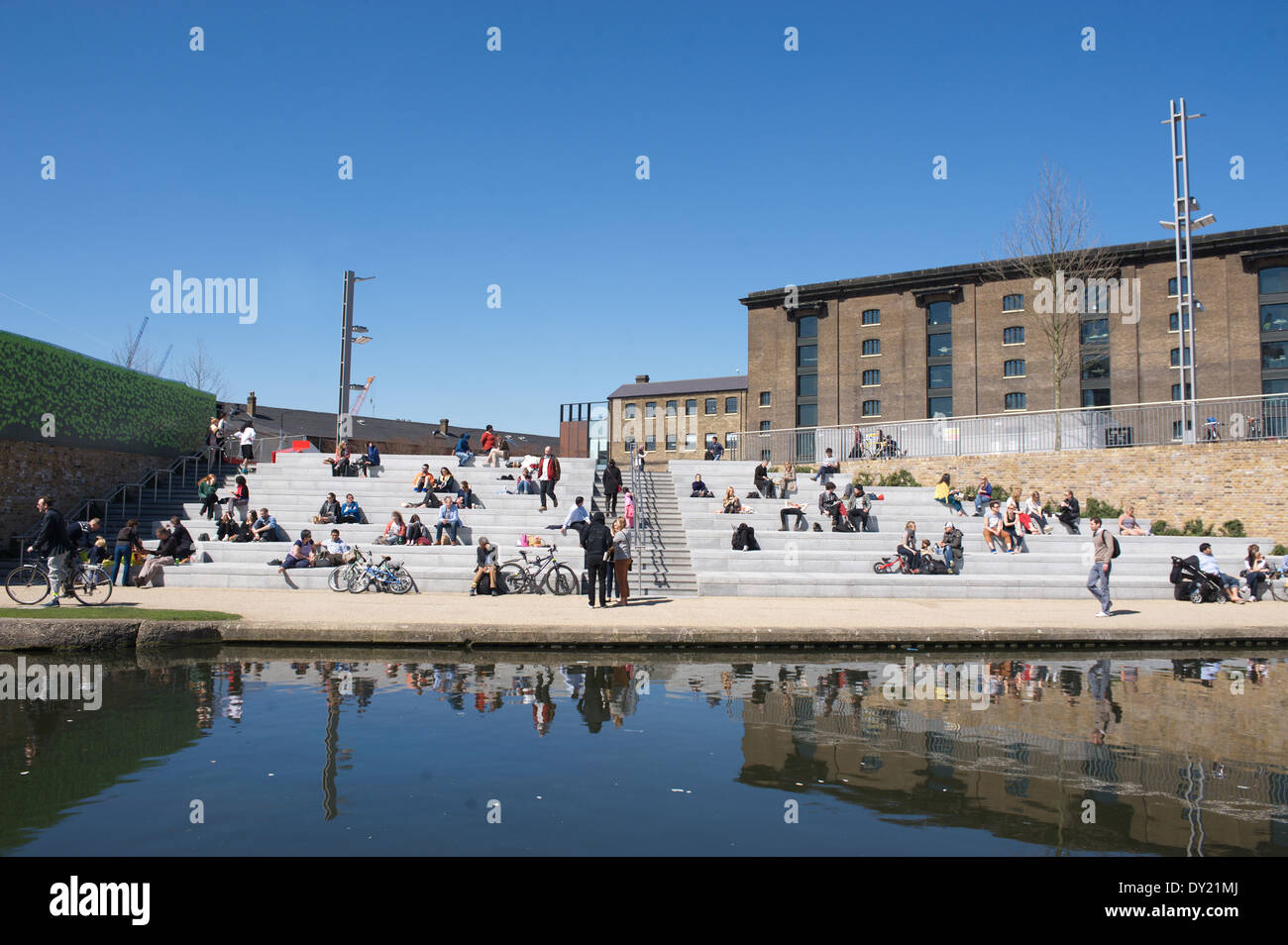Granary Square and on the steps to the Regent's Canal. Kings Cross ...