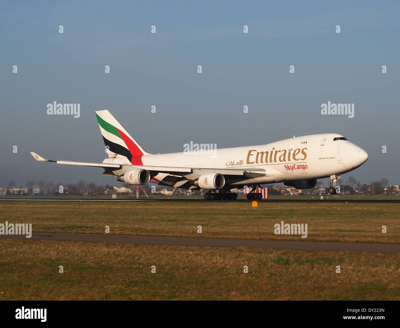 The Emirates Boeing 747-4HAF(ER), registration OO-THC, is captured ...
