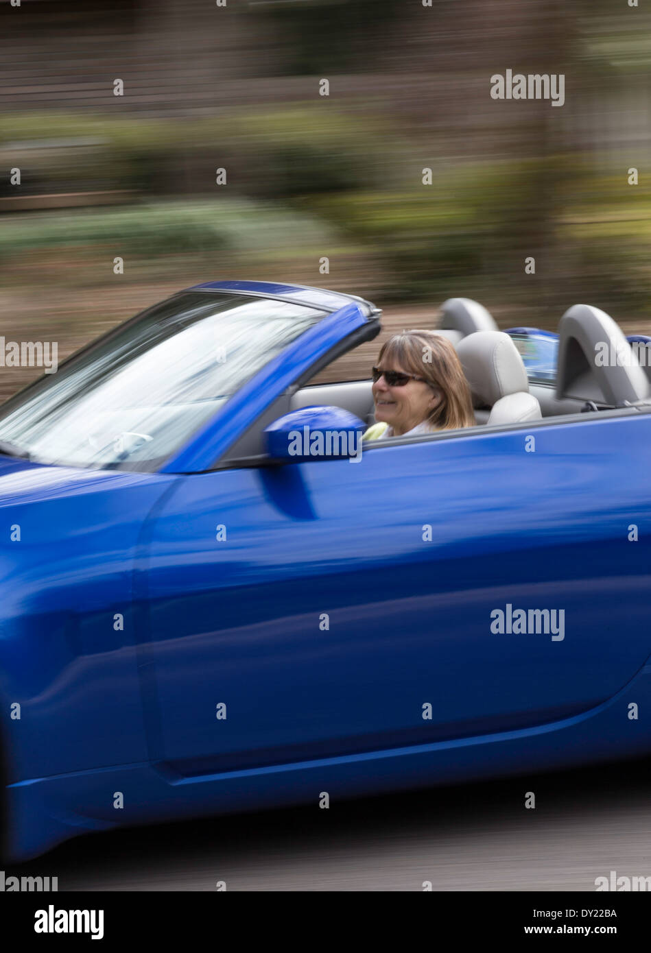 Mature woman and sports car hi-res stock photography and images - Alamy