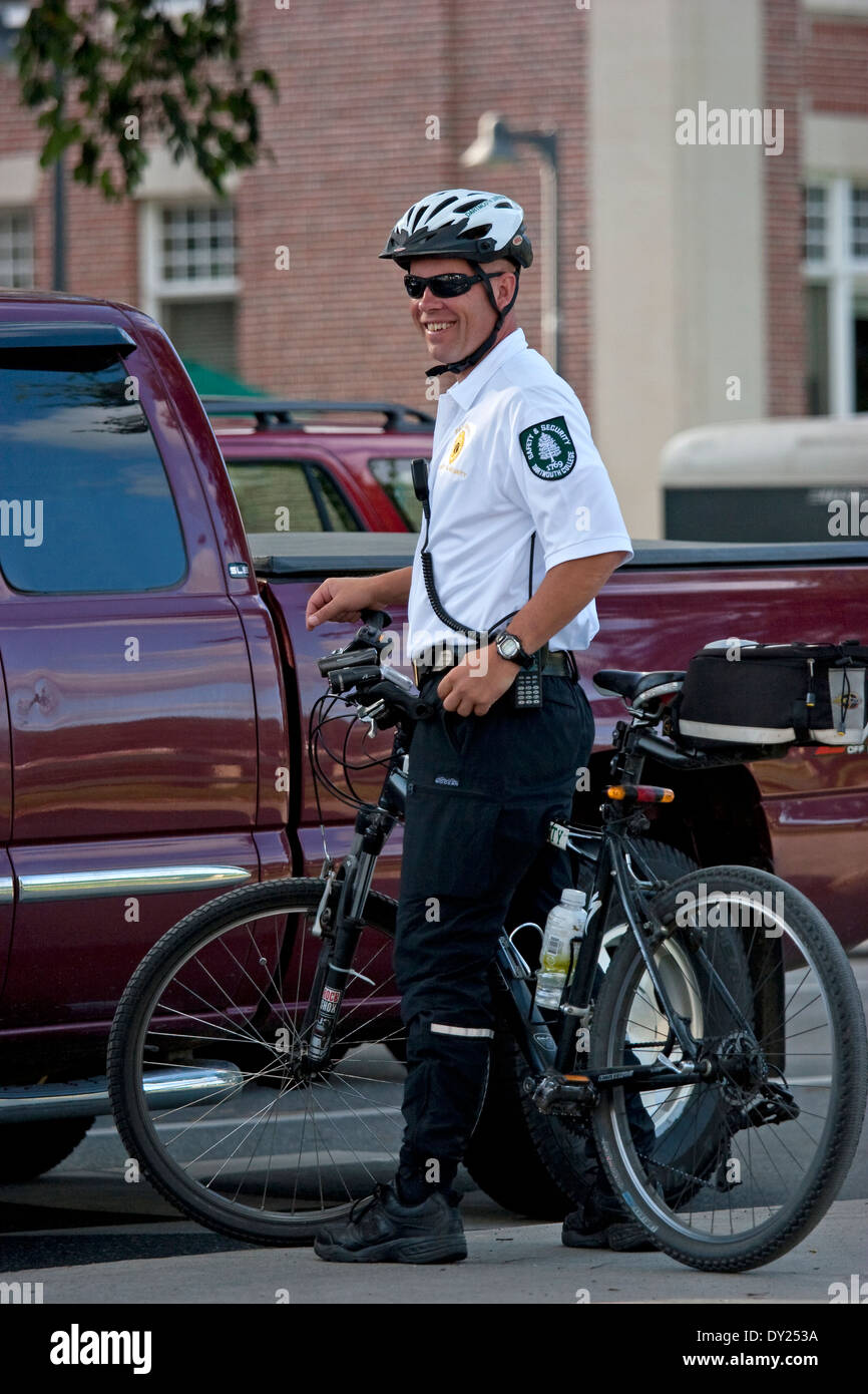 Bicycle security cop stopping vehicle Stock Photo - Alamy