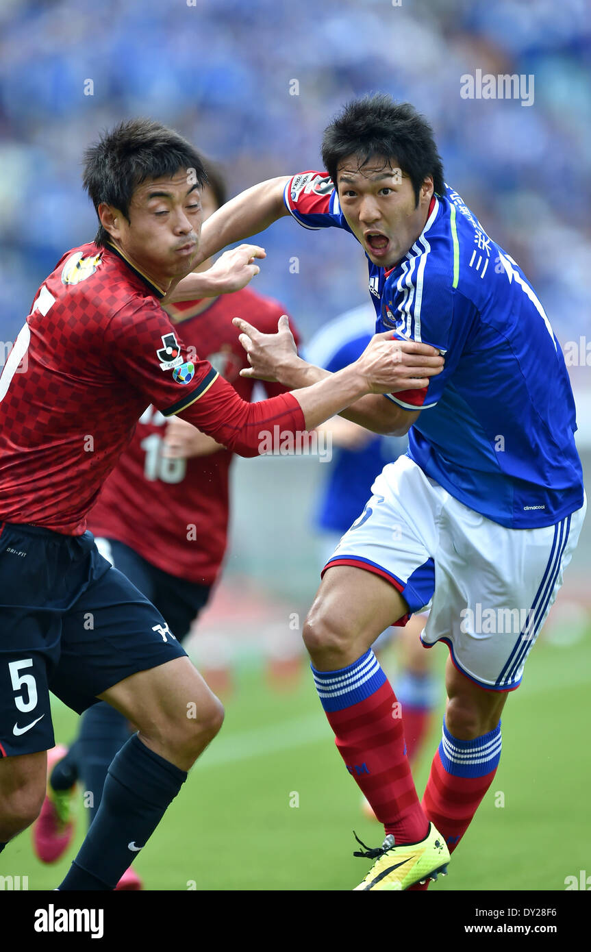 Kanagawa, Japan. 29th Mar, 2014. Takeshi Aoki (Antlers), Sho Ito (F ...