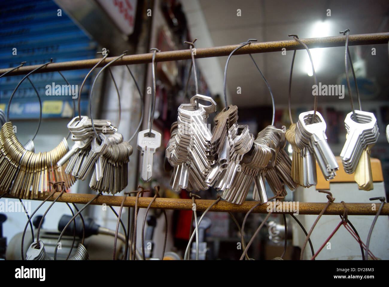 A bunch of keys, hanging in the key store Stock Photo - Alamy