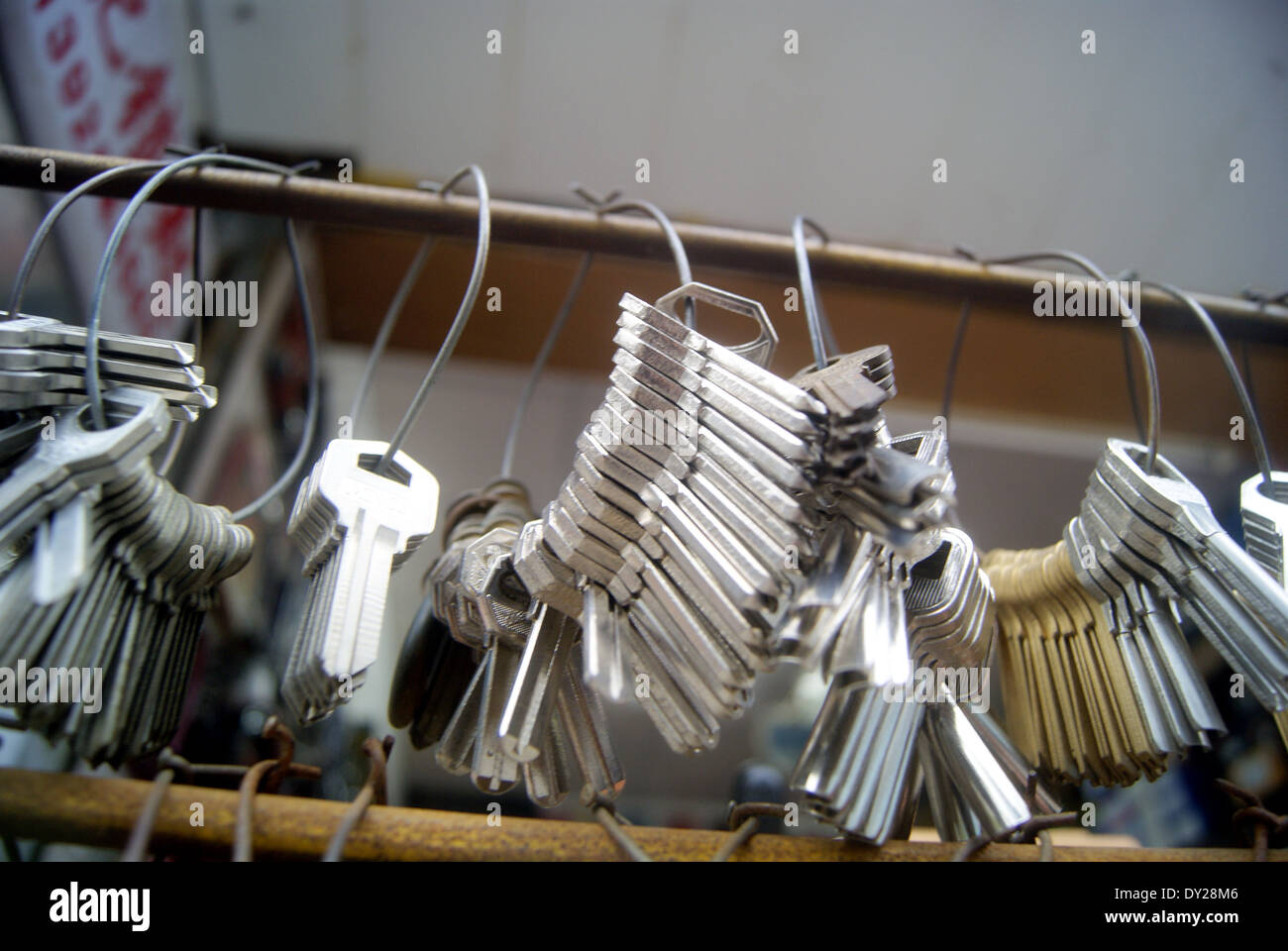 A bunch of keys, hanging in the key store Stock Photo - Alamy