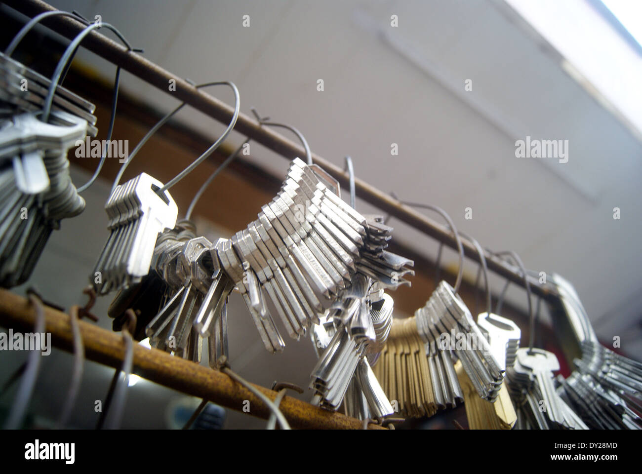 A bunch of keys, hanging in the key store Stock Photo - Alamy