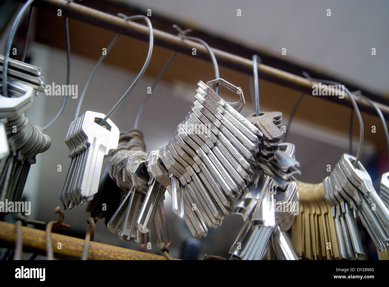 A bunch of keys, hanging in the key store Stock Photo - Alamy