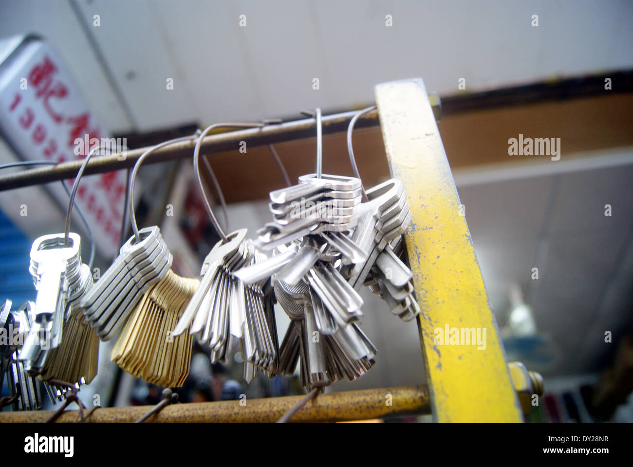 A bunch of keys, hanging in the key store Stock Photo - Alamy