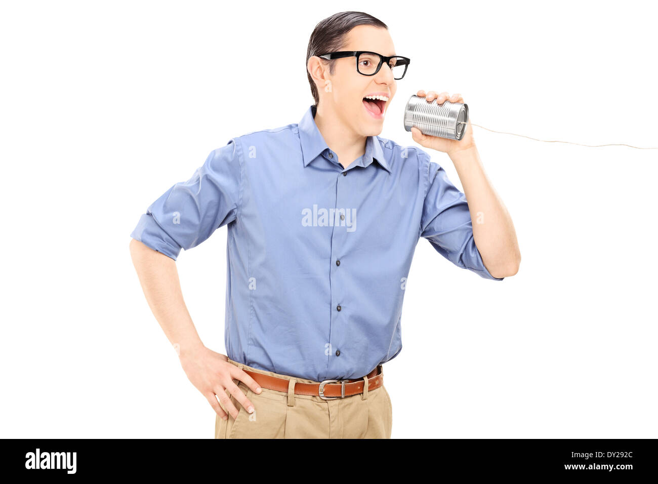 Man talking through a tin can phone Stock Photo - Alamy