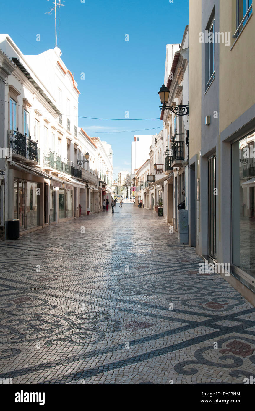 Traditional mosaic patterned tiled street in the old town of Faro ...