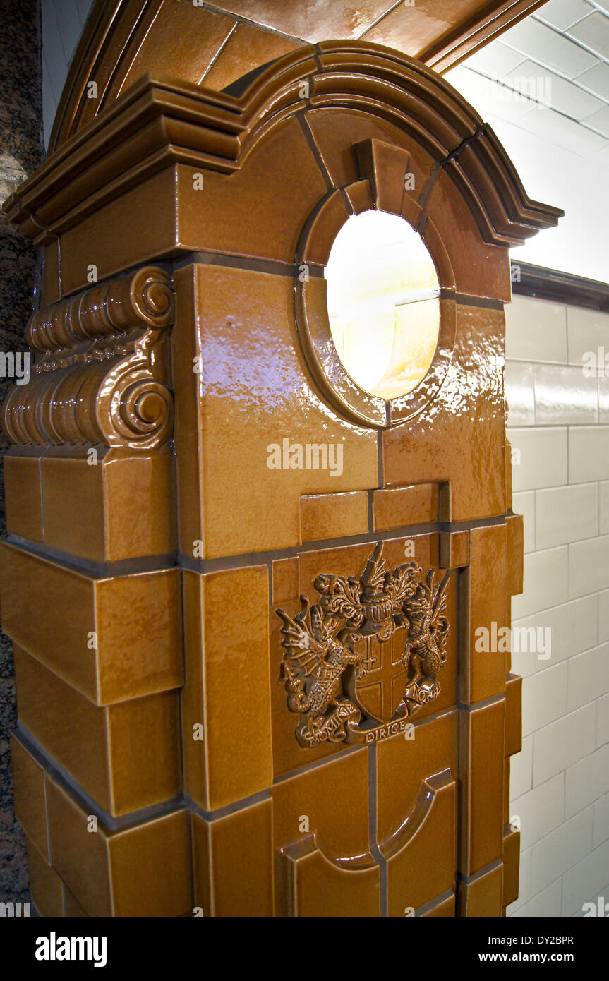 Ceramic pillar with City of London coat of arms in a pedestrian ...