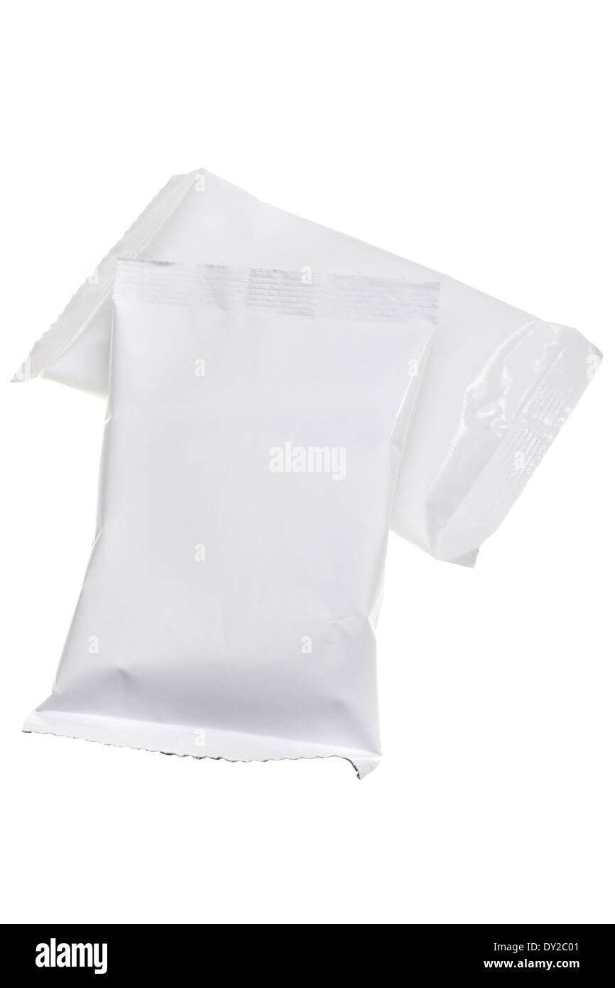 Two sealed white paper sachets Stock Photo - Alamy
