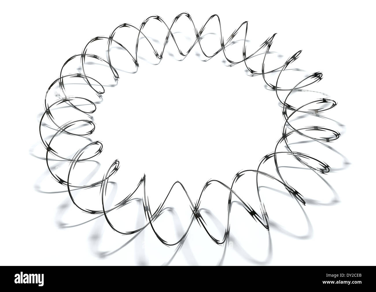 A circular shaped coil of razor wire on an isolated white background ...
