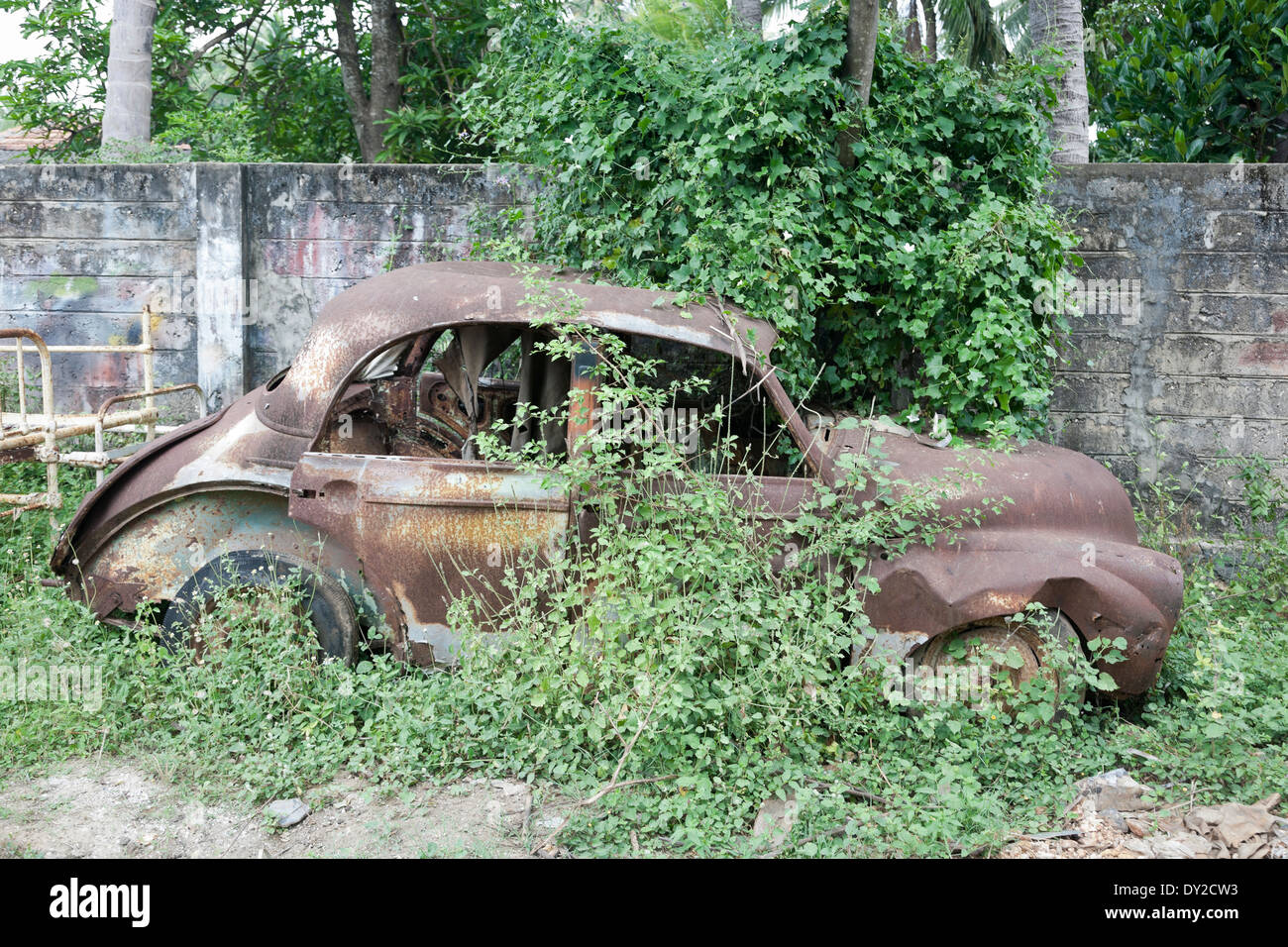 Jaffna, Sri Lanka, South Asia. Old Austin Morris Minor car in scrap ...