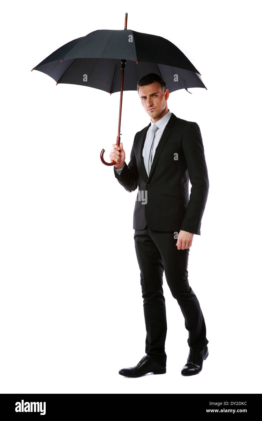 full-length portrait of a businessman holding umbrella isolated on a ...