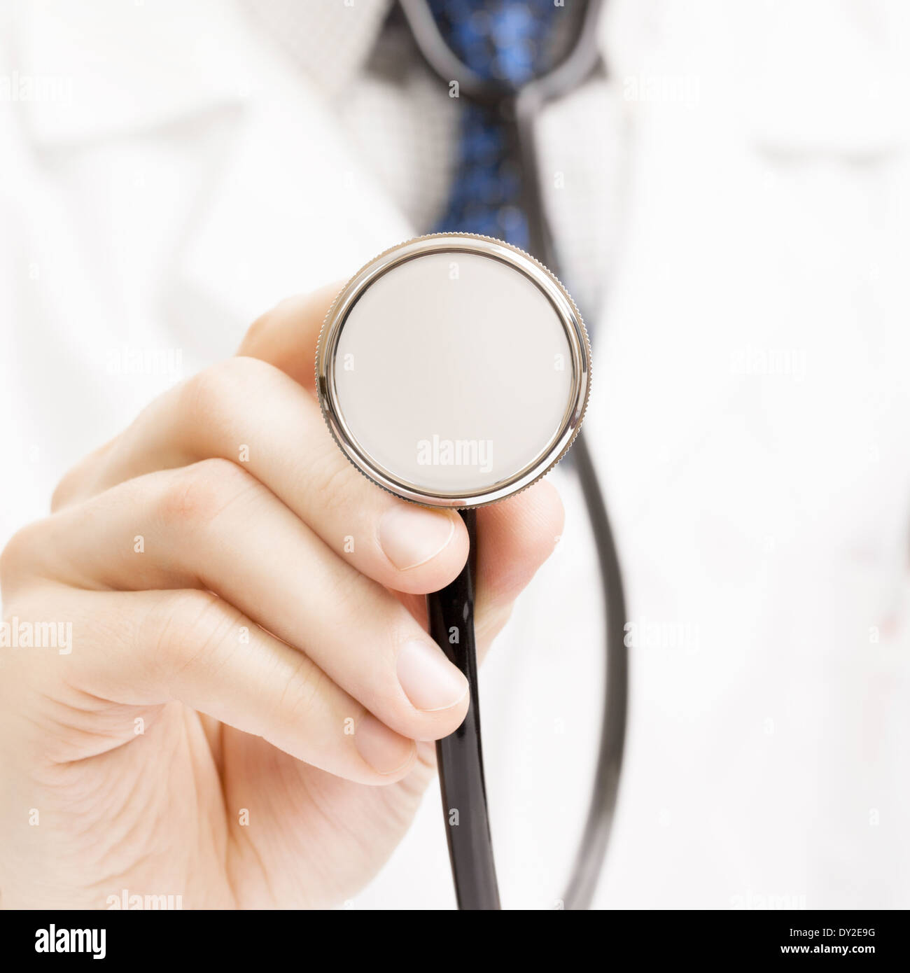 Medical doctor with stethoscope in his hand Stock Photo - Alamy