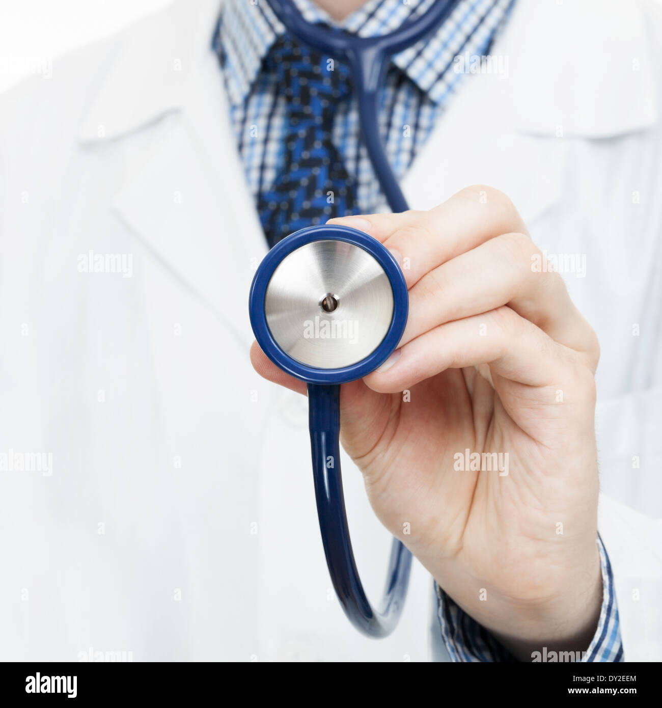 Medical doctor holding a stethoscope in his left hand Stock Photo - Alamy