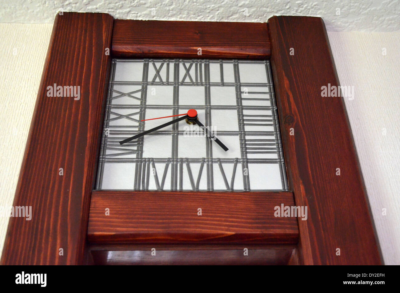 Charles Rennie Mackintosh style clock in the hall Stock Photo - Alamy