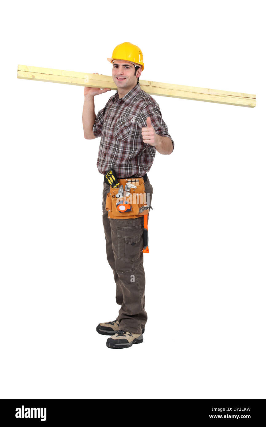 Happy carpenter with thumb up Stock Photo - Alamy