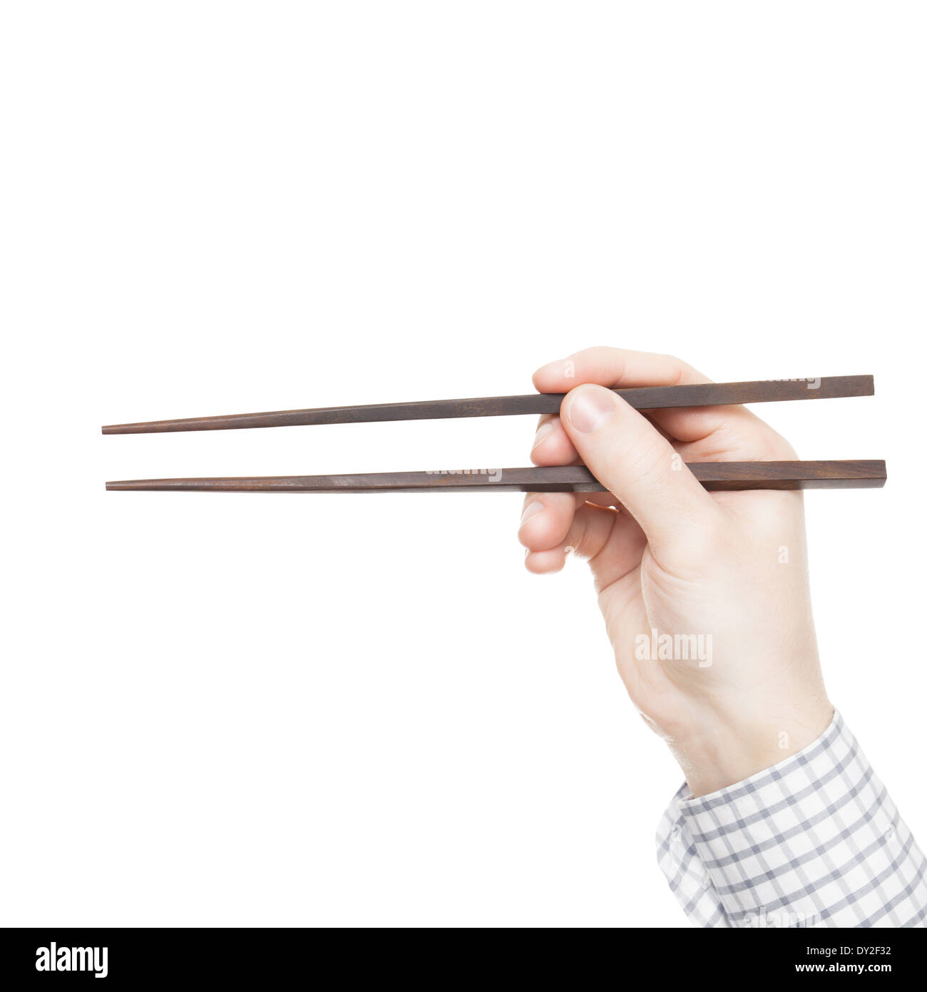Male holding chopsticks isolated on a white background Stock Photo - Alamy