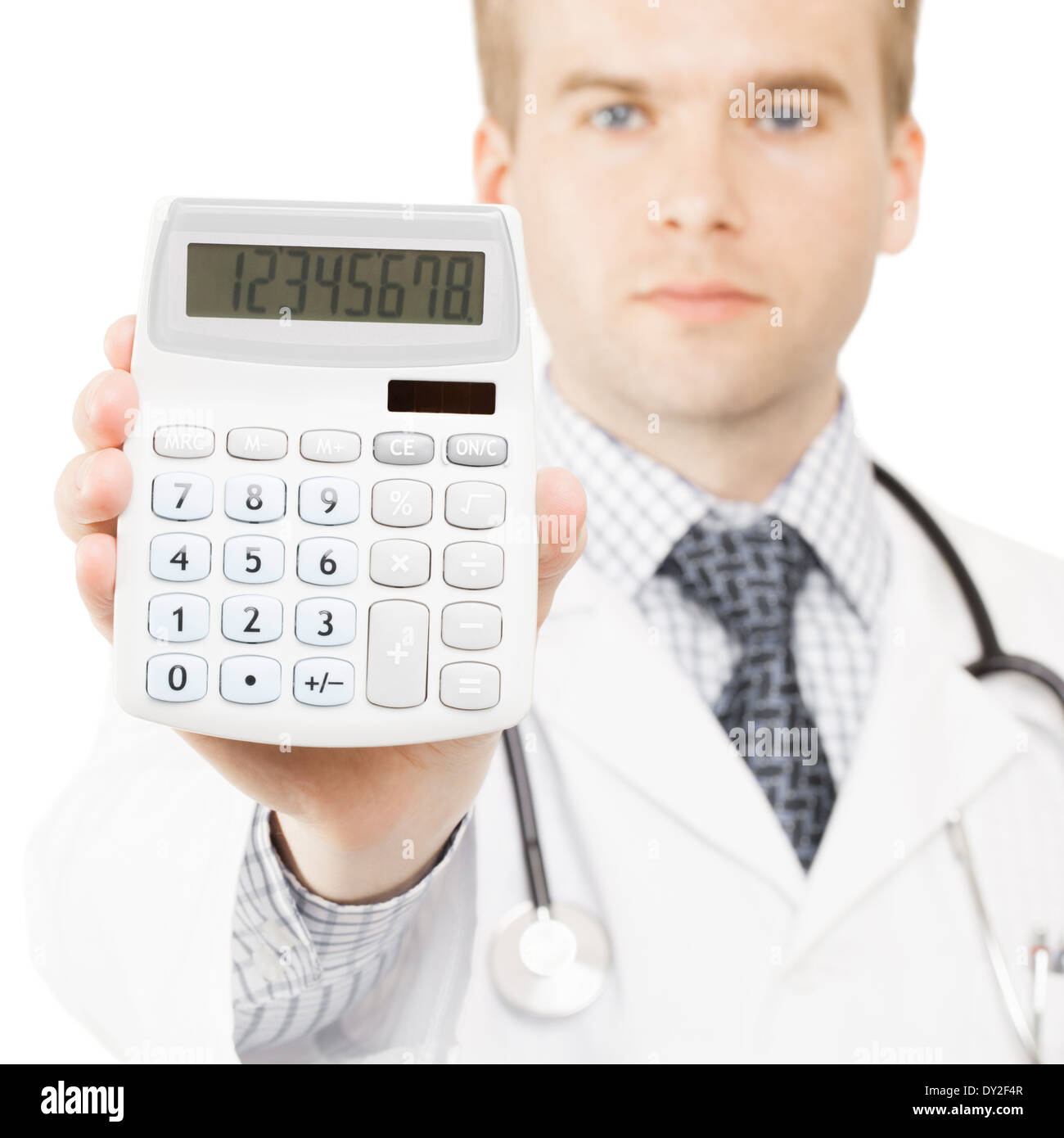 Medical doctor isolated on white with a calculator in his right hand ...