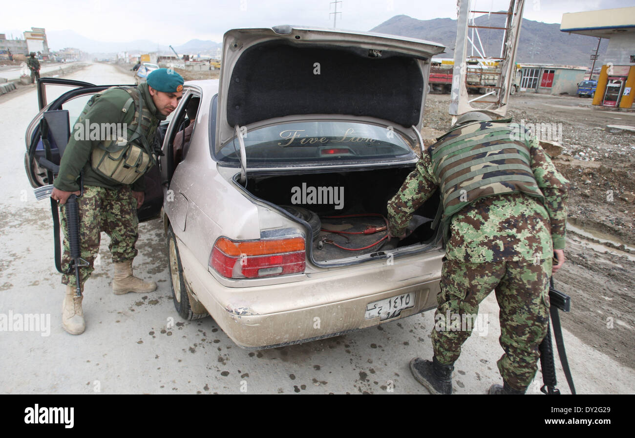 Kabul, Afghanistan. 4th Apr, 2014. Afghan Army soldiers check a vehicle ...