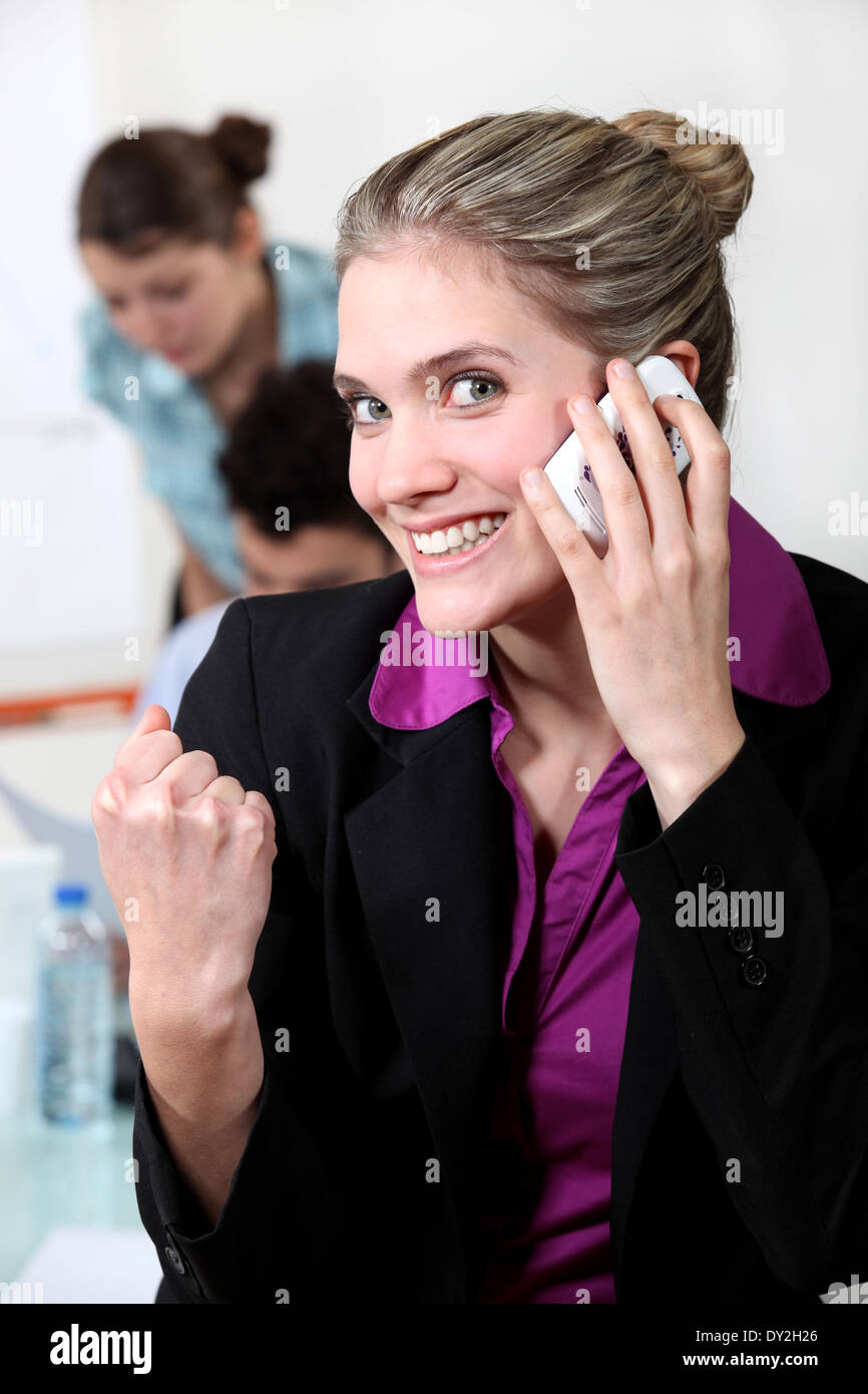 Woman closing a deal Stock Photo - Alamy
