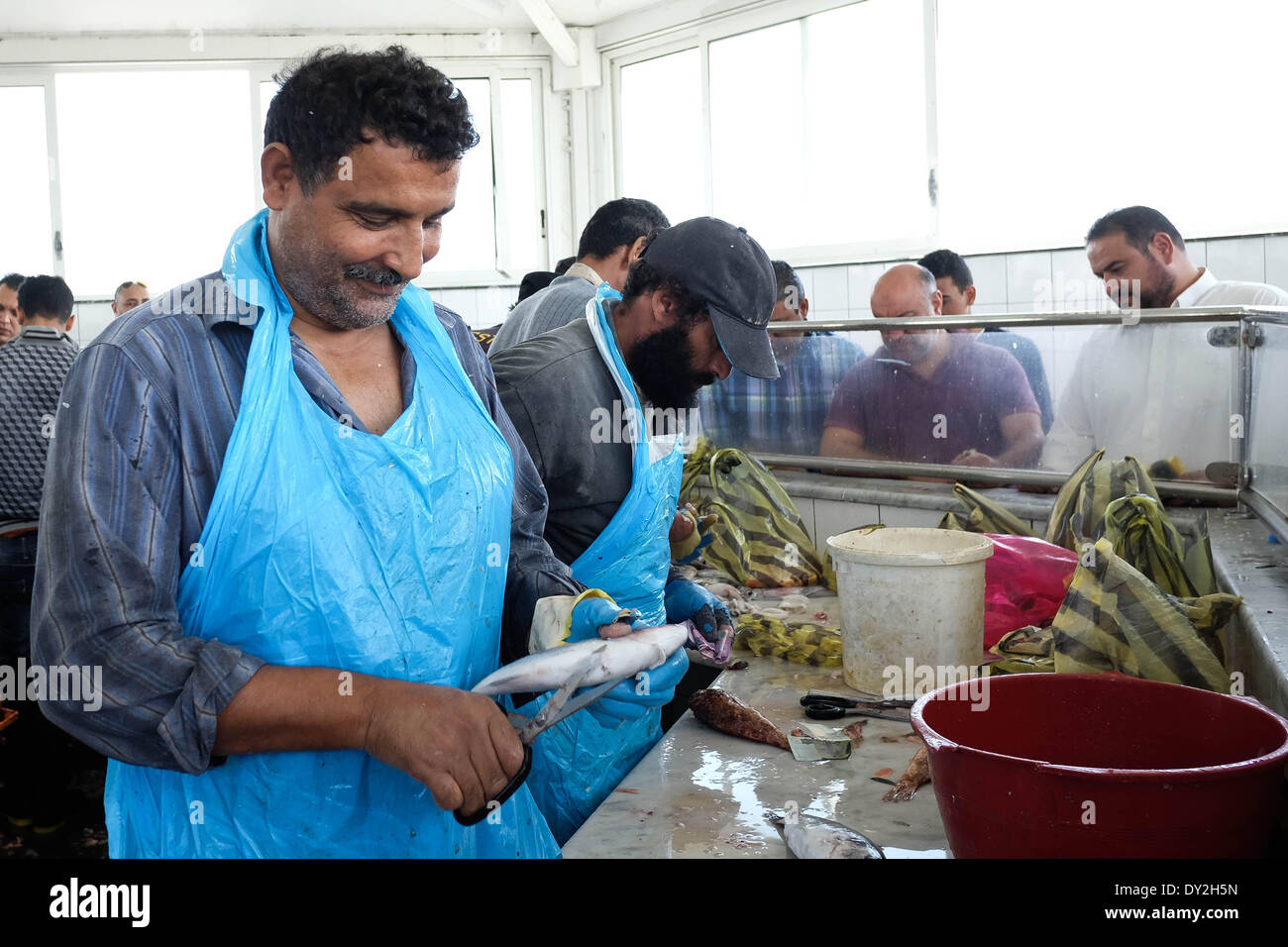 Tripoli, Libya. 4th Apr, 2014. Citizens buy fishes at a seafood market ...