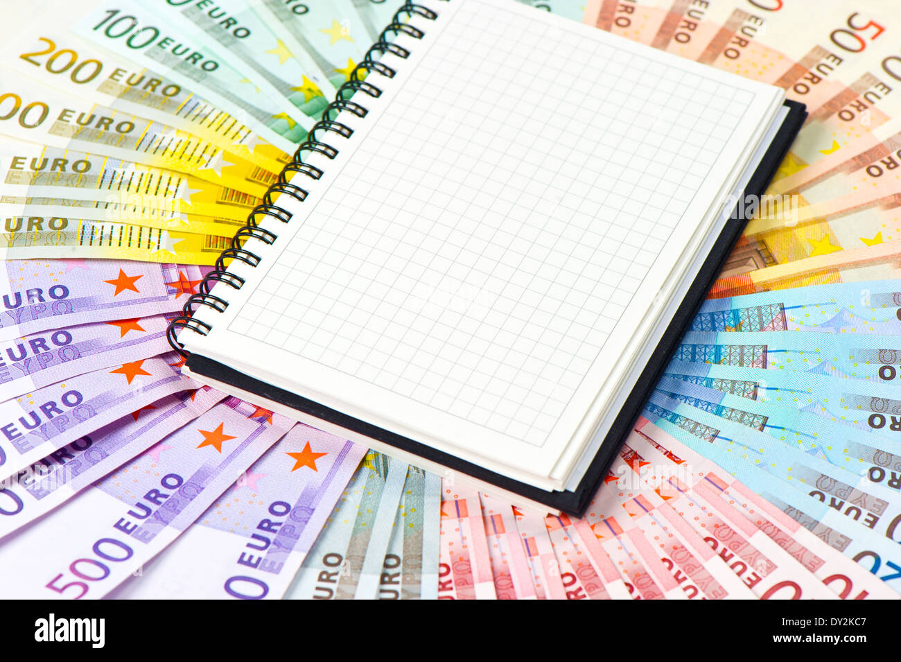 note book over euro banknotes. money concept. selective focus Stock ...