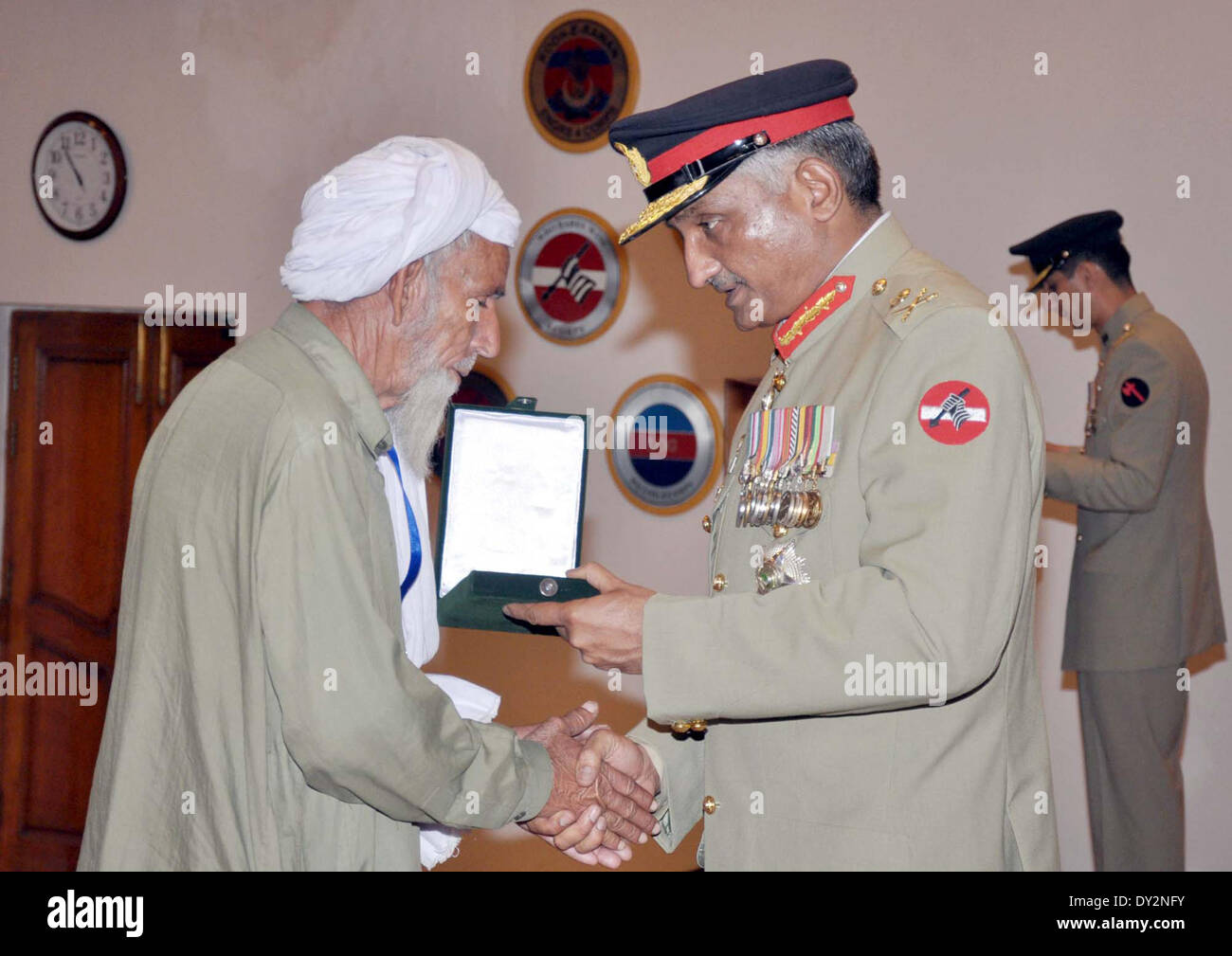 Commander Lahore Corps, Lieutenant General Naweed Zaman conferring gallantry awards to the Next ...