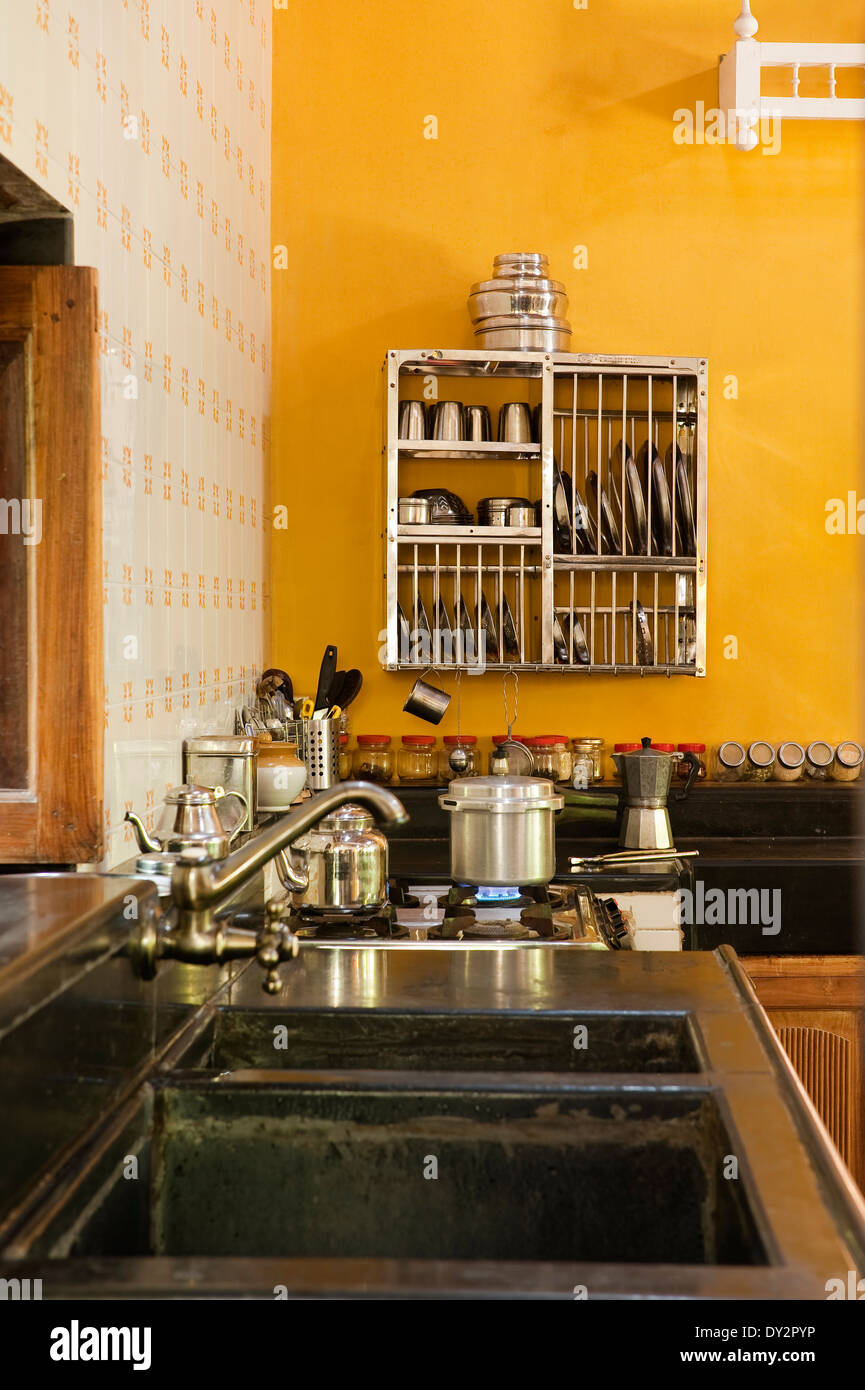 Goan kitchen detail with metallic plate rack and double sink Stock ...