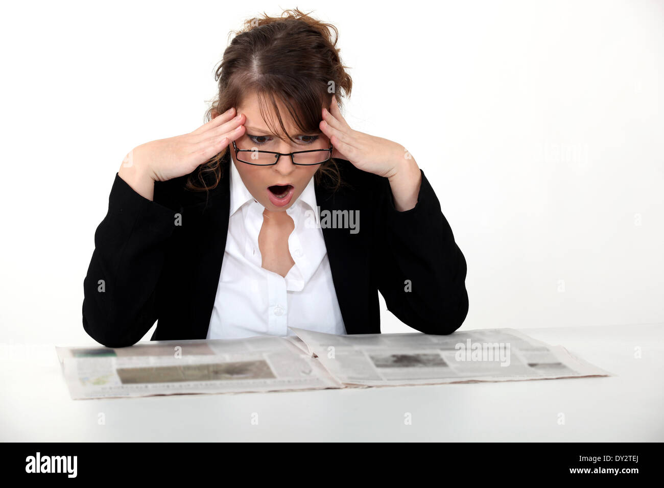 Person holding reading open newspaper hi-res stock photography and ...