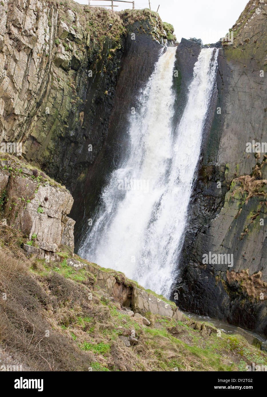 Spekes Mill Mouth Waterfall As Water Cascades Over Steep Cliff Near