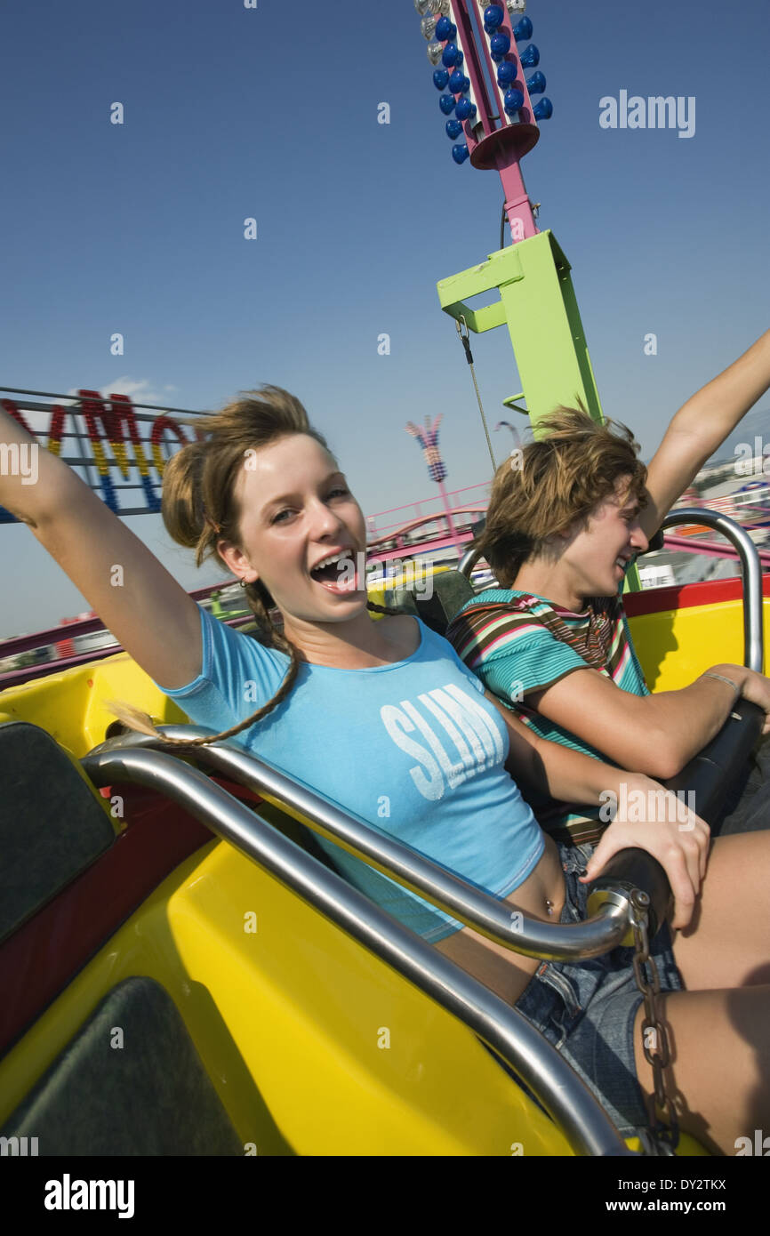 Teenage couple on roller coaster hi-res stock photography and images ...