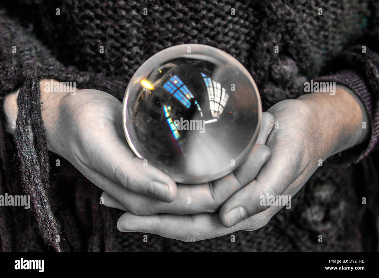 Fortune teller Palm reader holding crystal ball Stock Photo - Alamy