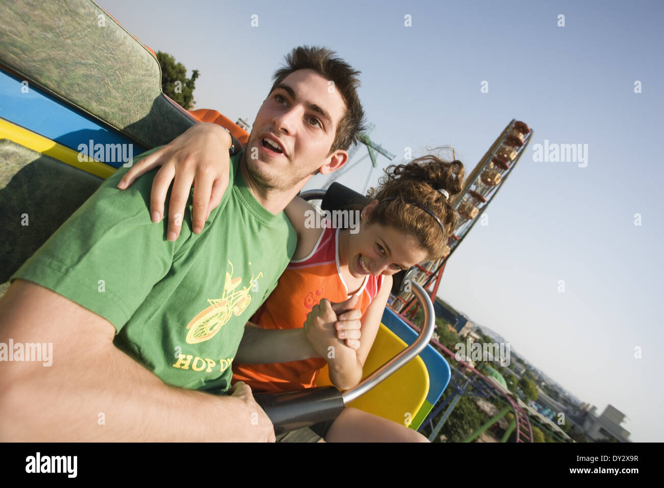Teenage couple on roller coaster hi-res stock photography and images ...