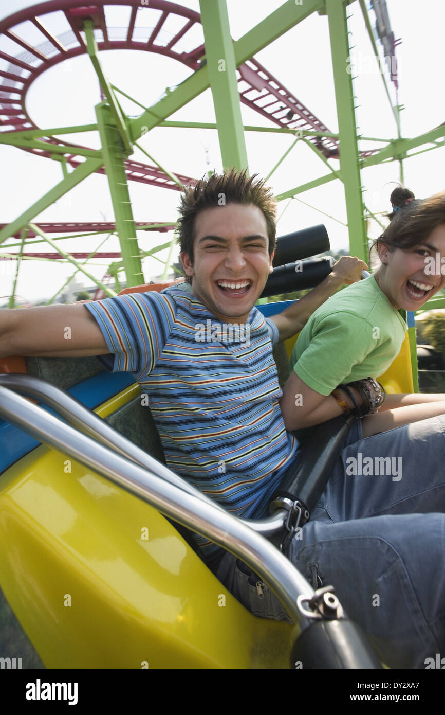 Teenage couple on roller coaster hi-res stock photography and images ...