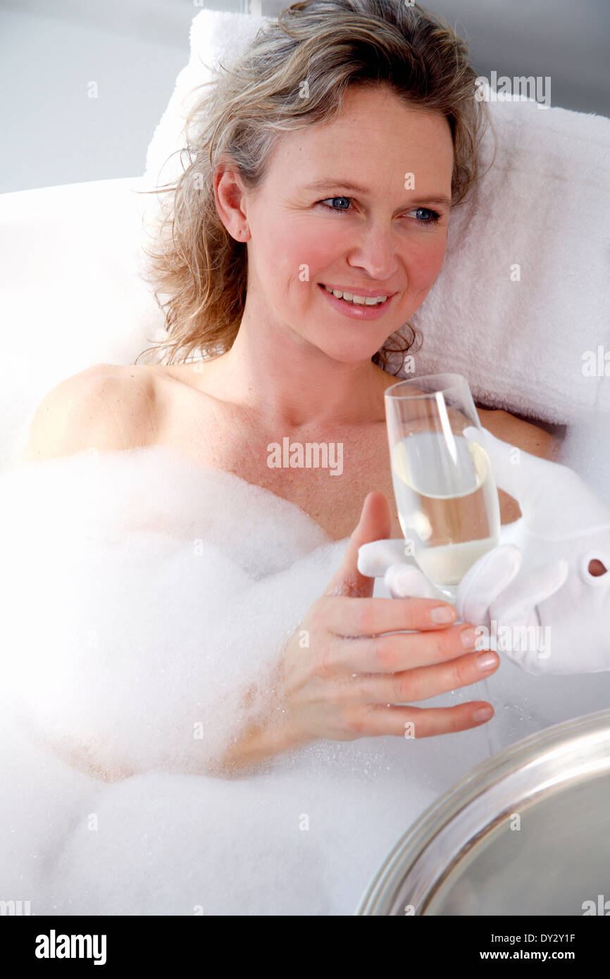 Mature woman enjoying bubble bath hi-res stock photography and images ...