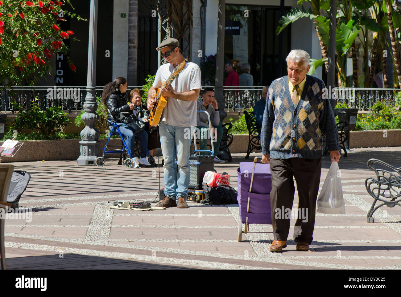 Street musicians giving a performance on a square in Fuengirola, Costa ...