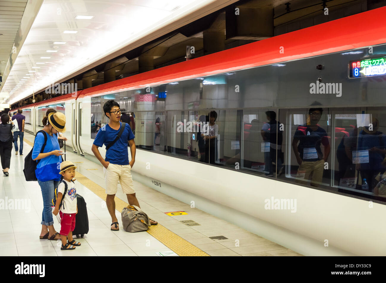 Boarding the NEX Train from Narita Airport to downtown Tokyo Stock ...