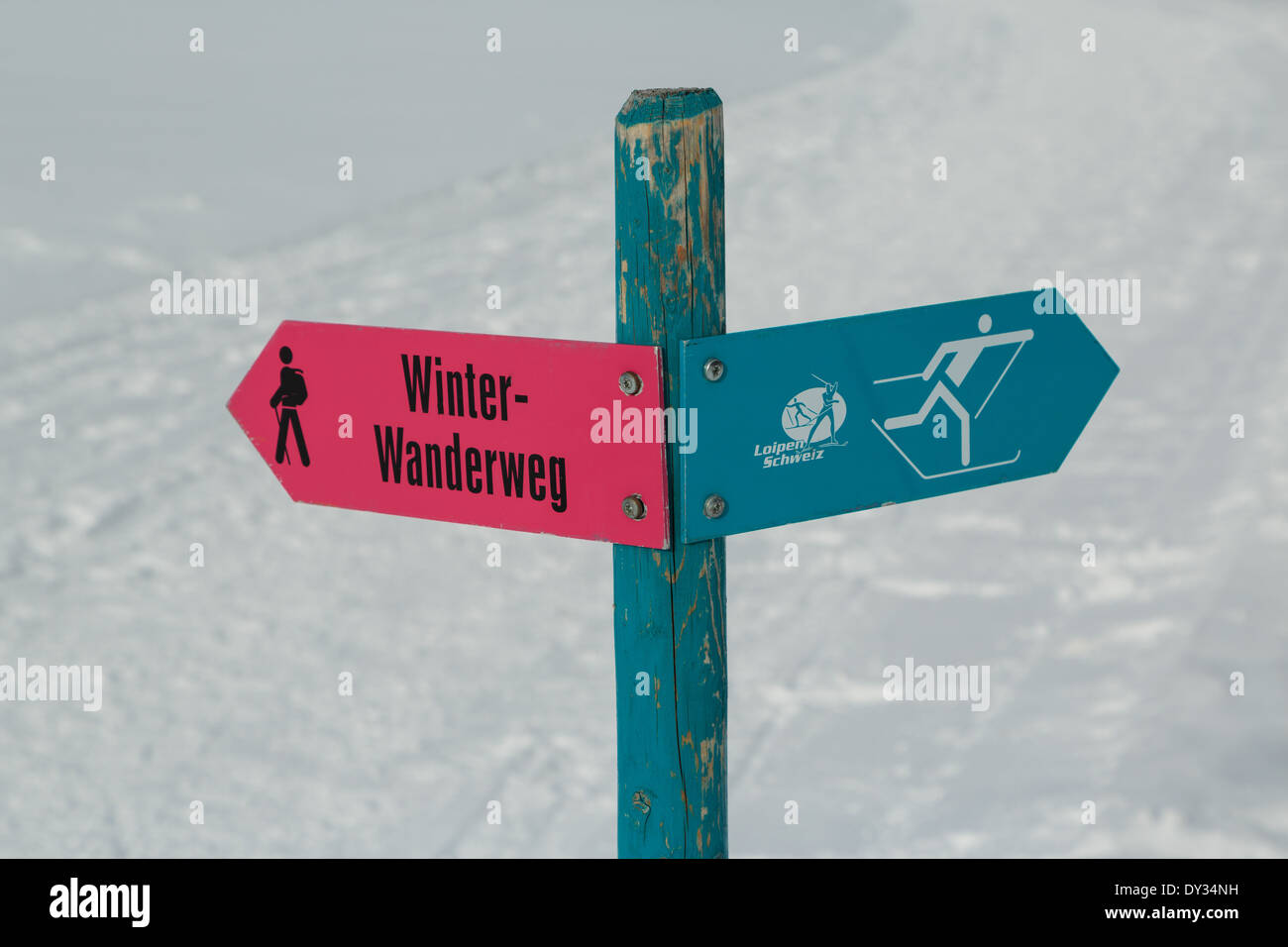 A photograph of a sign for a winter hiking trail (Wanderweg in German ...