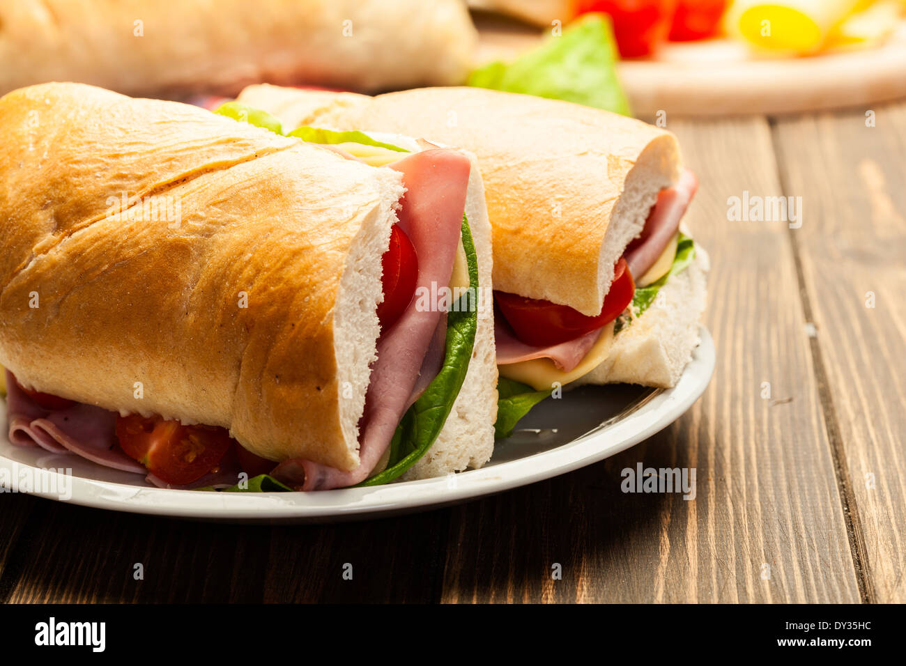 Italian panini sandwich with ham, cheese and tomato Stock Photo - Alamy