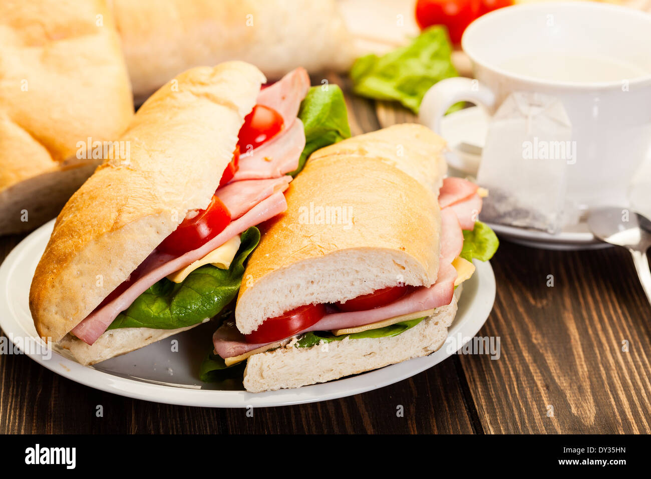 Italian panini sandwich with ham, cheese and tomato Stock Photo - Alamy