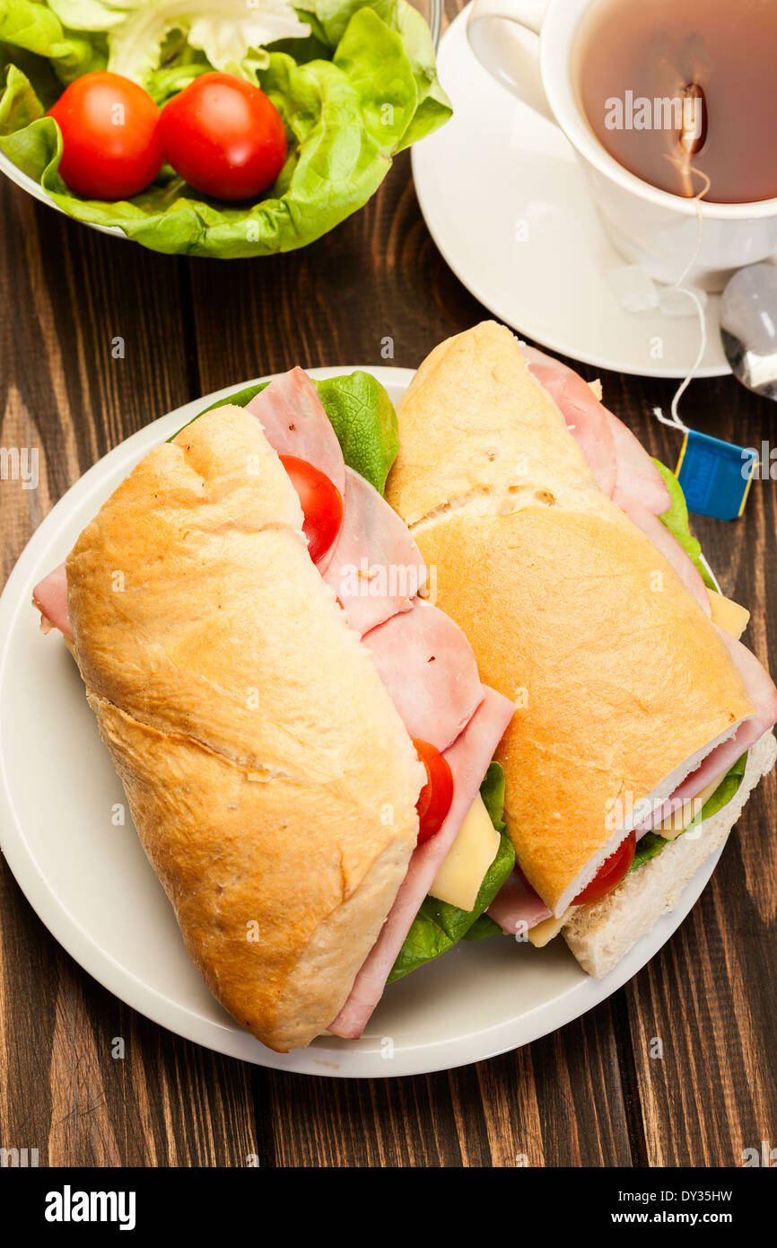 Italian panini sandwich with ham, cheese and tomato Stock Photo - Alamy