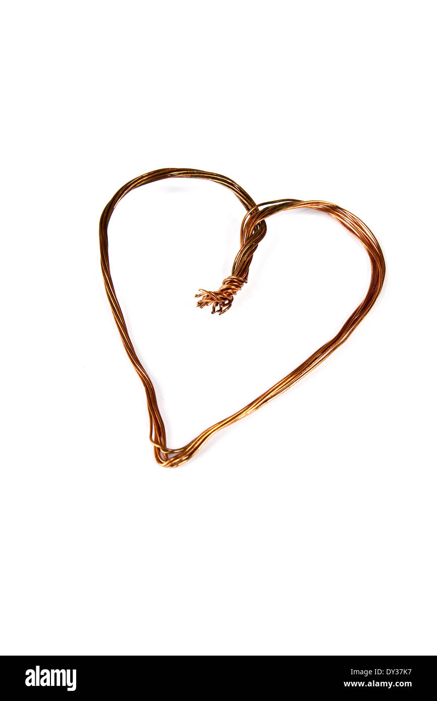 Wire bent in the shape of a heart on a white background Stock Photo - Alamy