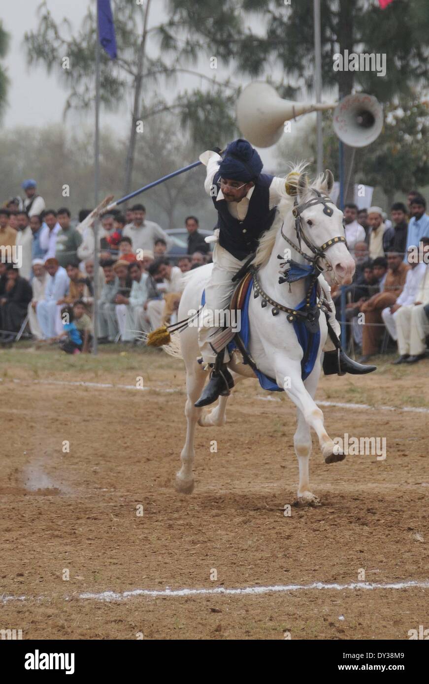 PAKISTAN, Islamabad-April 05:A Pakistani horse rider wearing the ...