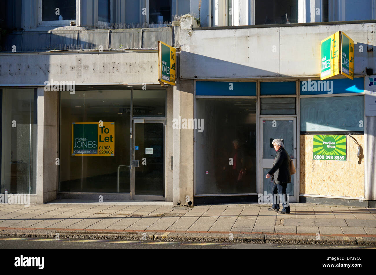 Row of shops in pedestrianised part of Worthing town centre West Sussex ...