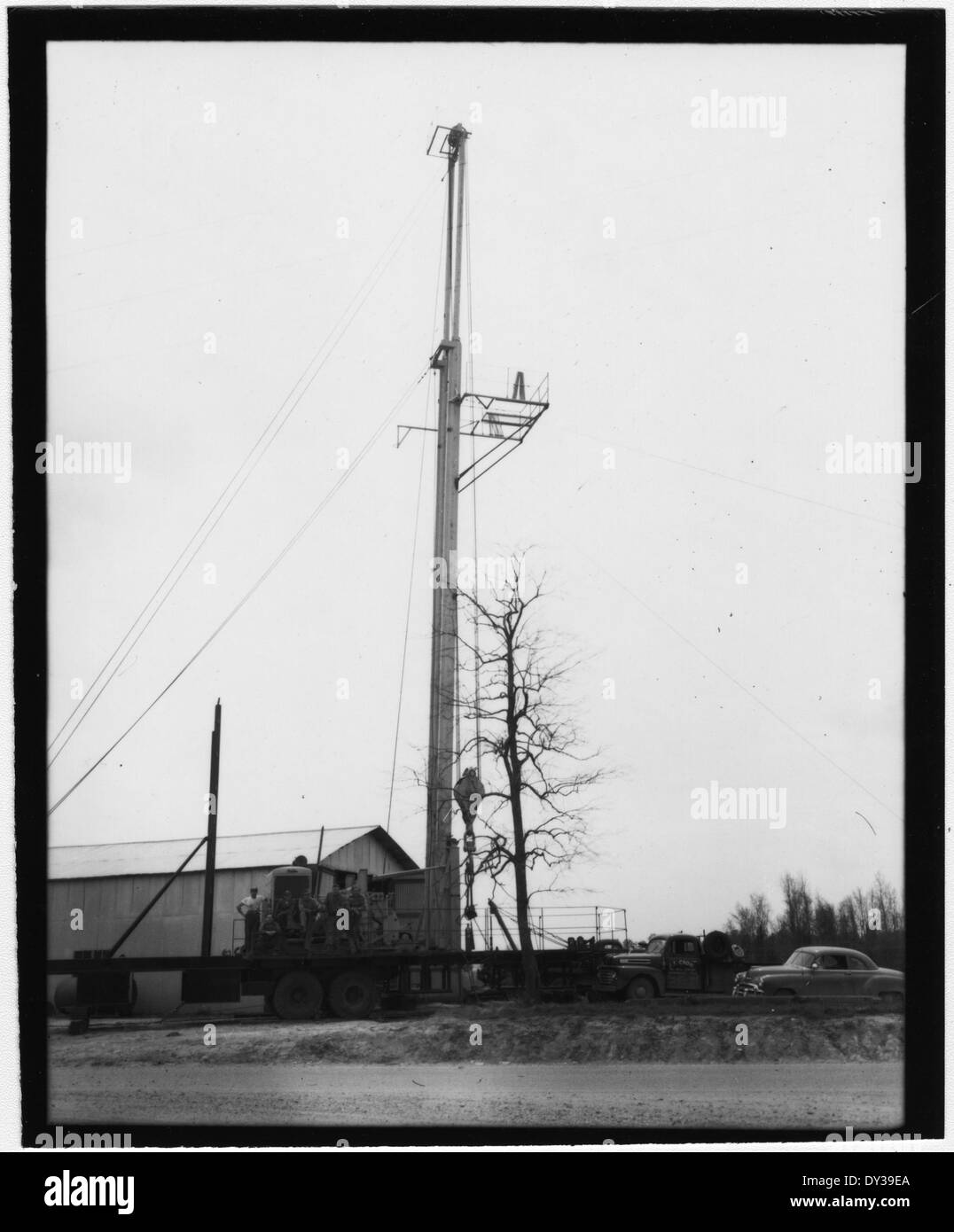 A photograph of J. F. Crow’s portable oil derrick, located five miles ...