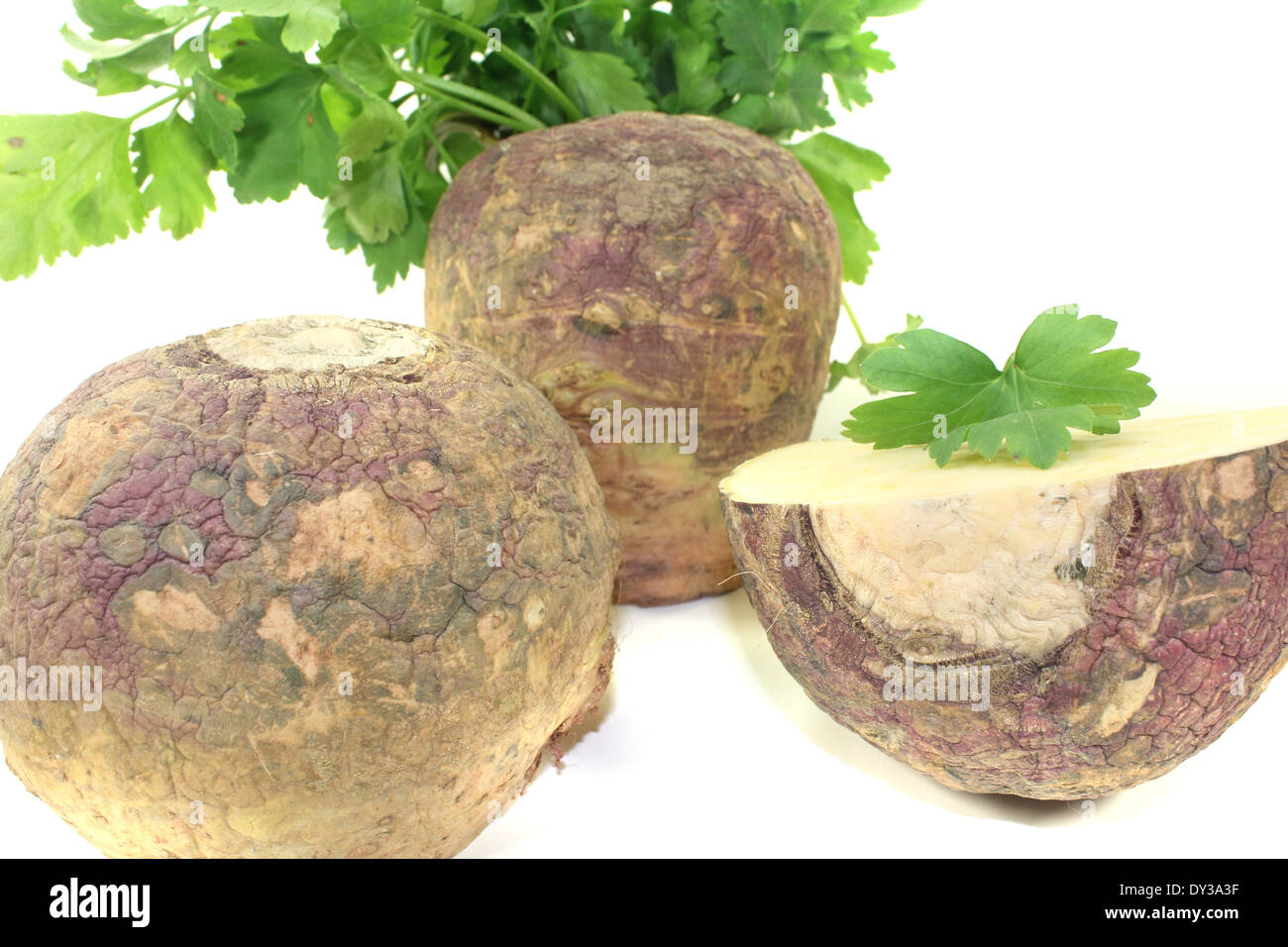 yellow rutabaga with parsley and napkin on a light background Stock ...