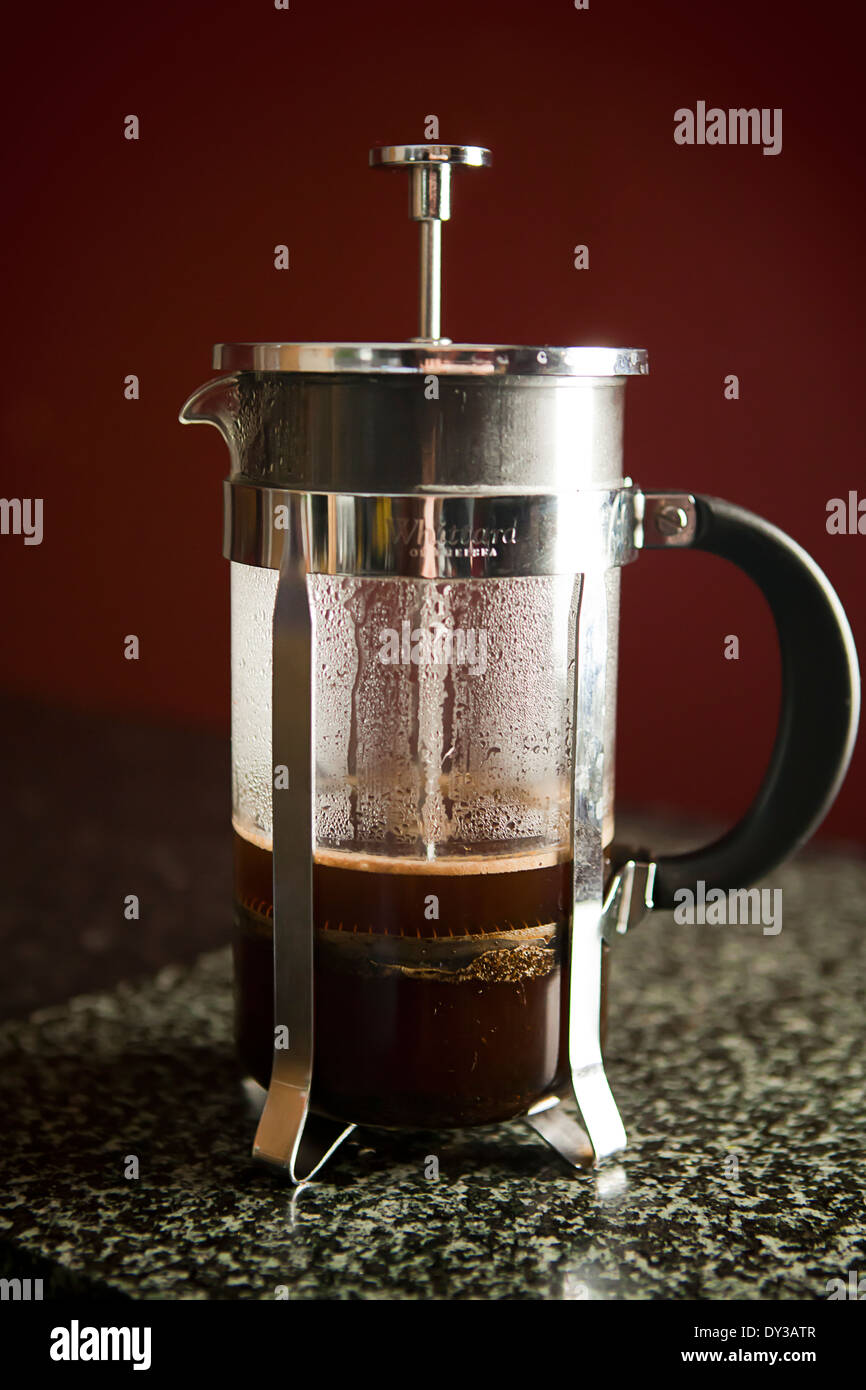 Coffee brewing in a French Press Stock Photo - Alamy