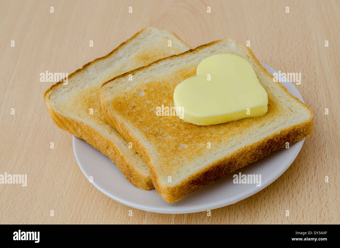 Two slices toast butter hi-res stock photography and images - Alamy