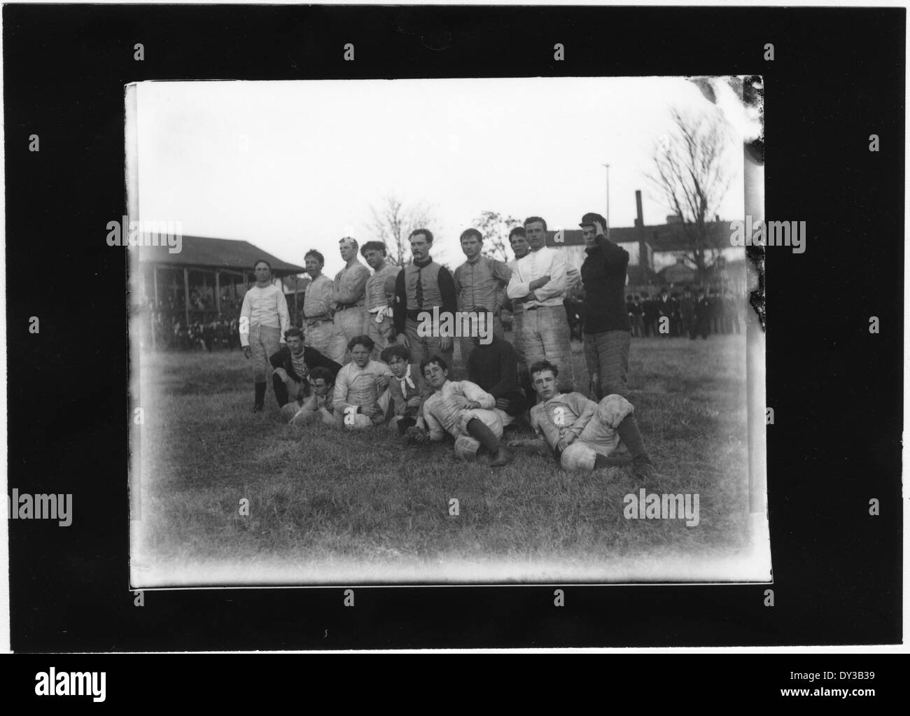 A photograph of a football team, capturing the athletes in their team ...